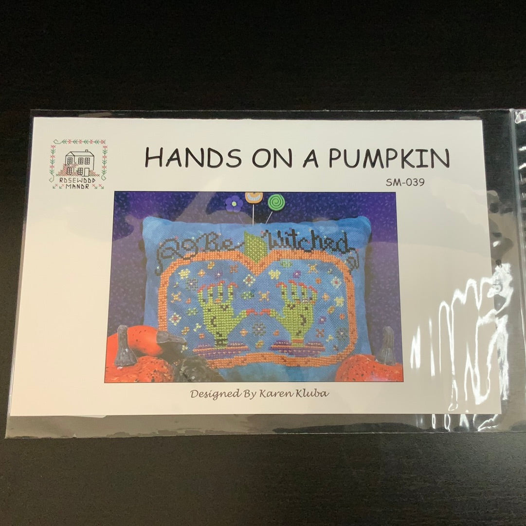 Hands on a Pumpkin – Riverview Stitching